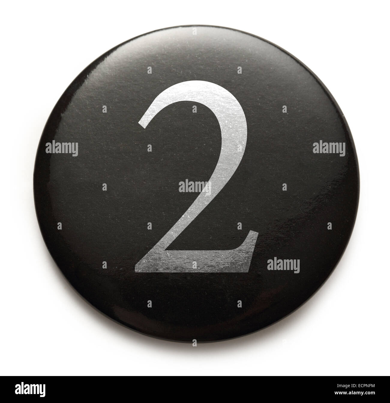 White number 2 on black round badge Stock Photo - Alamy