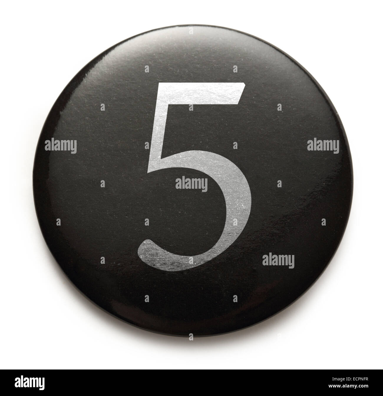 White number 5 on black round badge Stock Photo - Alamy