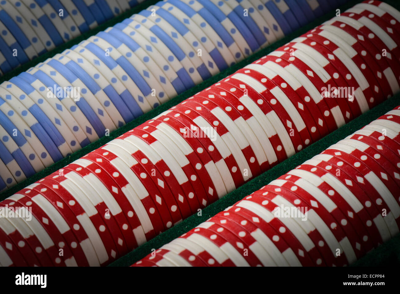 Poker Chips in a Row Close Up Stock Photo - Alamy
