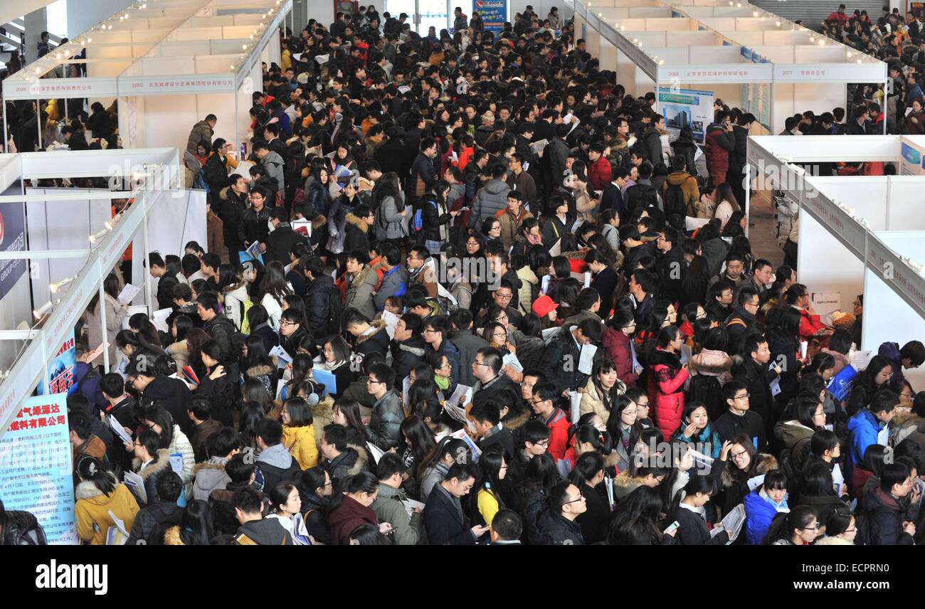 Beijing, China. 18th Dec, 2014. Job seekers attend a job fair for ...