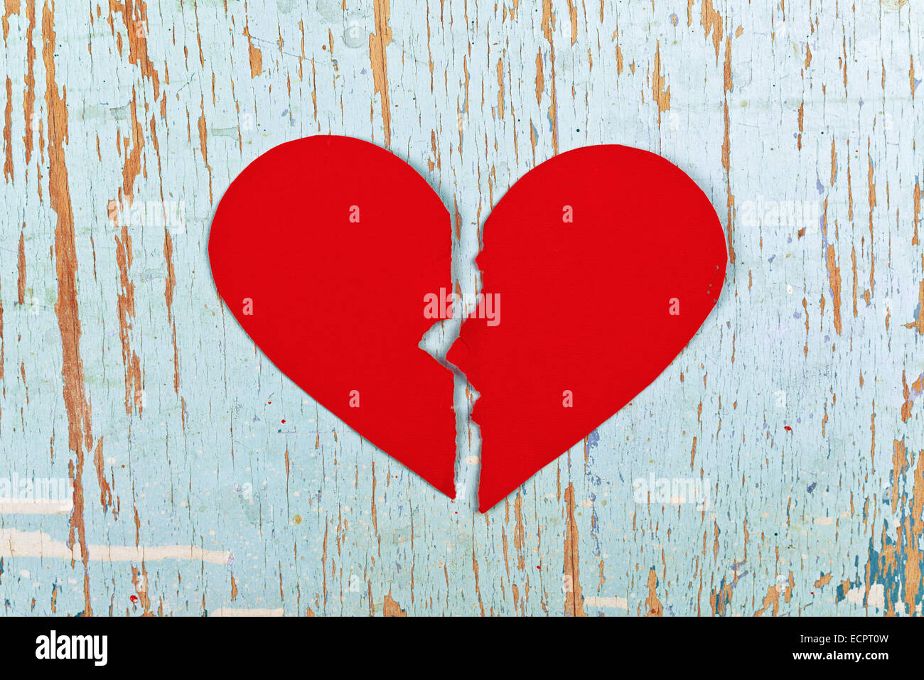Brokenhearted concept as Valentine's Day background with broken red ...