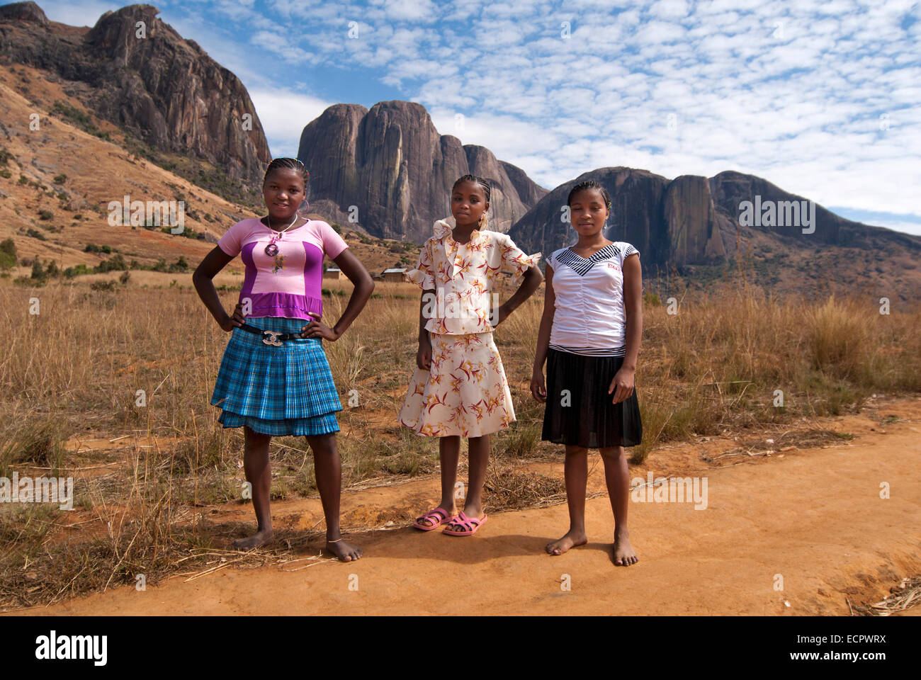 Three young Girls wearing their best Sunday clothes pose for a shot in ...