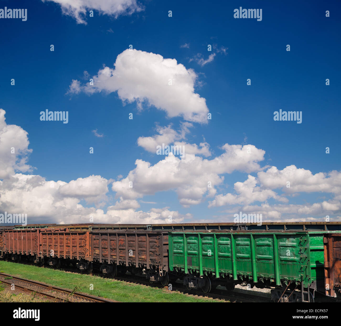 Cargo trains with a blue sky background Stock Photo - Alamy