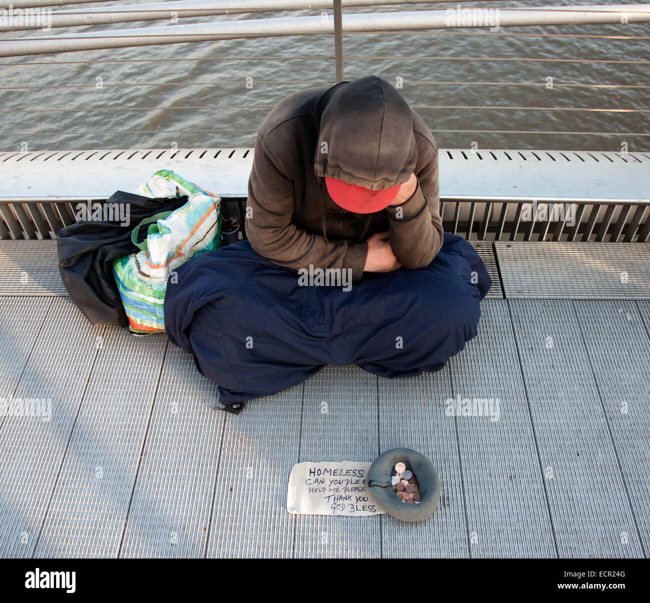 Homeless person on Millennium Bridge London Stock Photo - Alamy