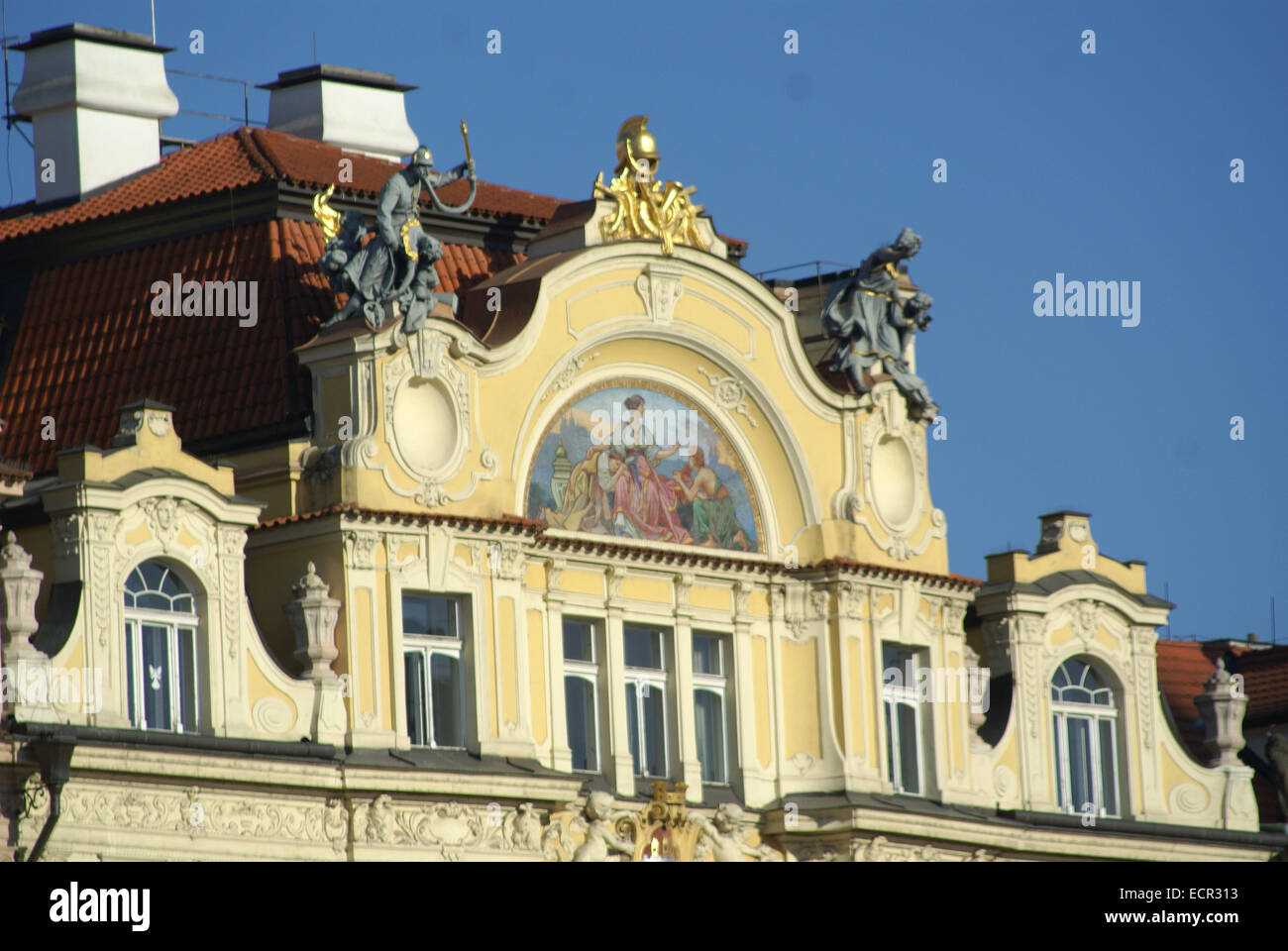 Prague elegant buildings, roofs, statues, windows make for interesting ...