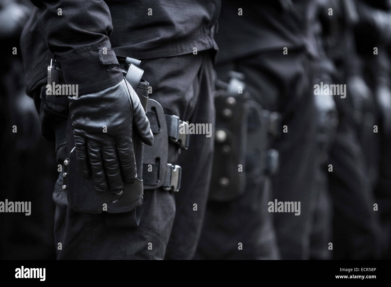 Army soldier standing holding glove uniform in a row hi-res stock ...