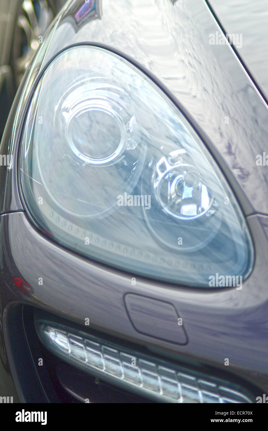 Headlight car premium. Part of the machine Reflection Stock Photo - Alamy