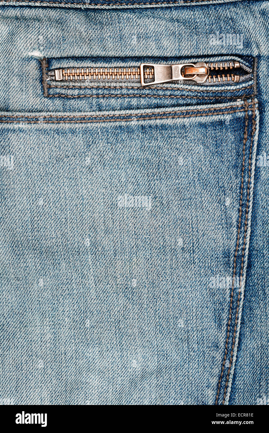 Blue jeans fabric with zipper background Stock Photo - Alamy