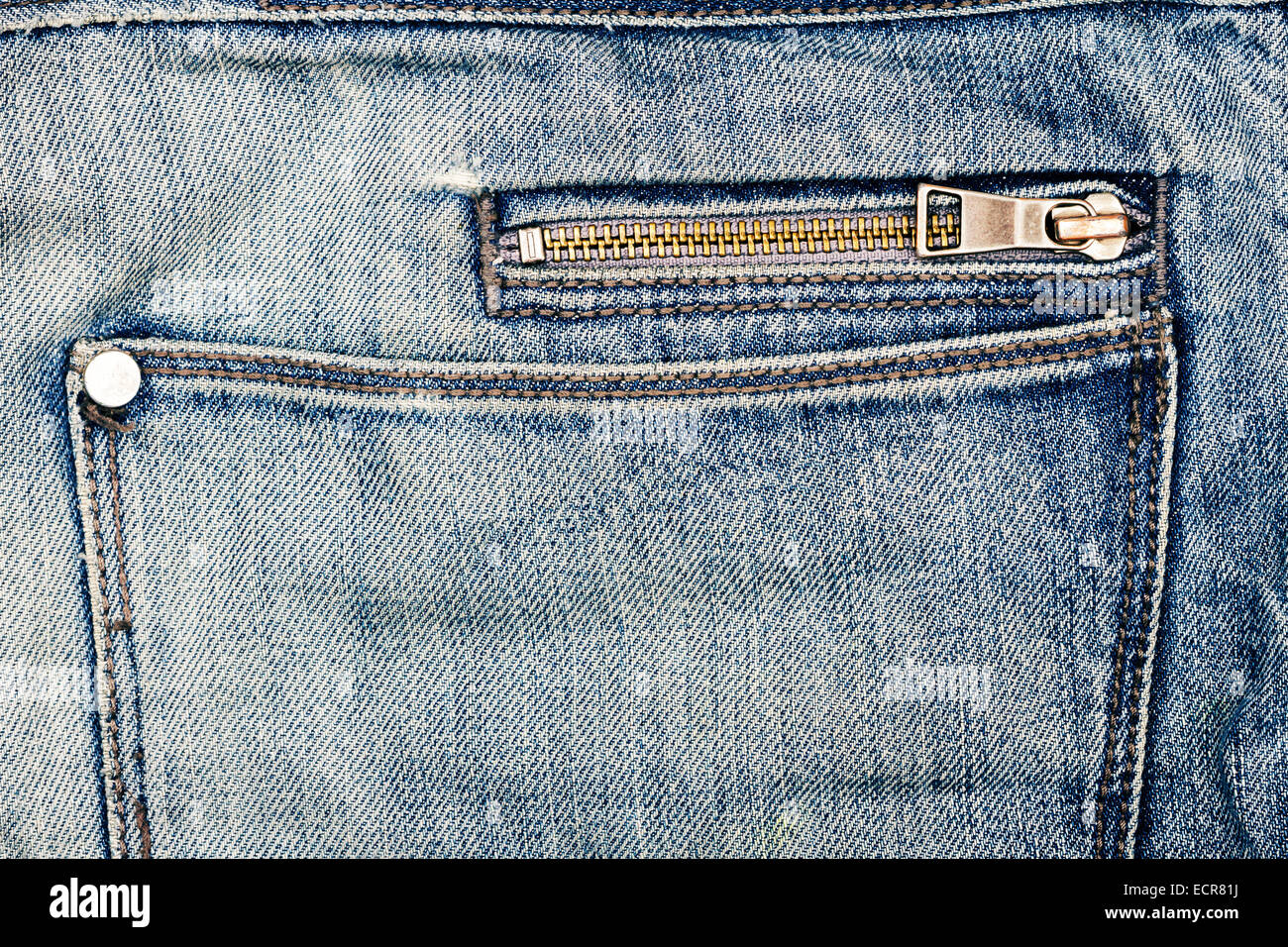 Blue jeans fabric with zipper background Stock Photo - Alamy