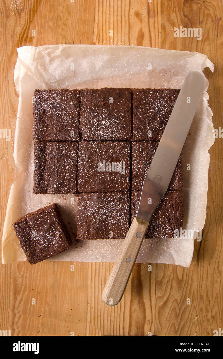 Making and serving chocolate brownies Stock Photo - Alamy