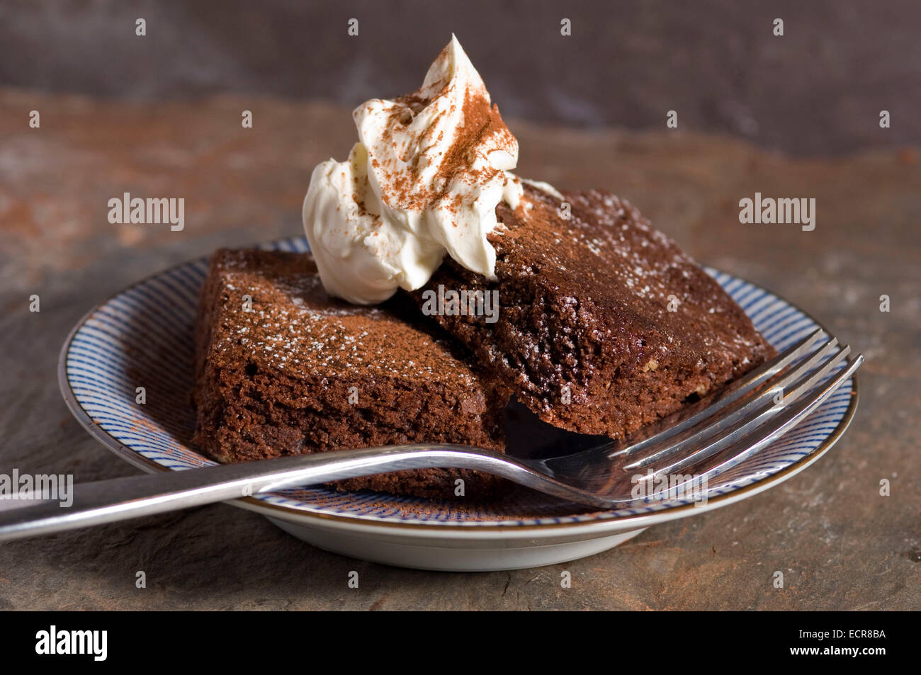 Making and serving chocolate brownies Stock Photo - Alamy