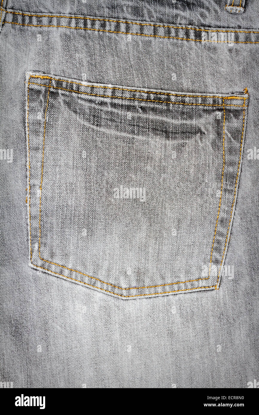 Gray jeans fabric with back pocket background Stock Photo - Alamy