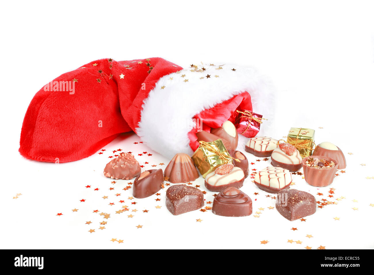 Chocolate and santa boot on a white background Stock Photo - Alamy