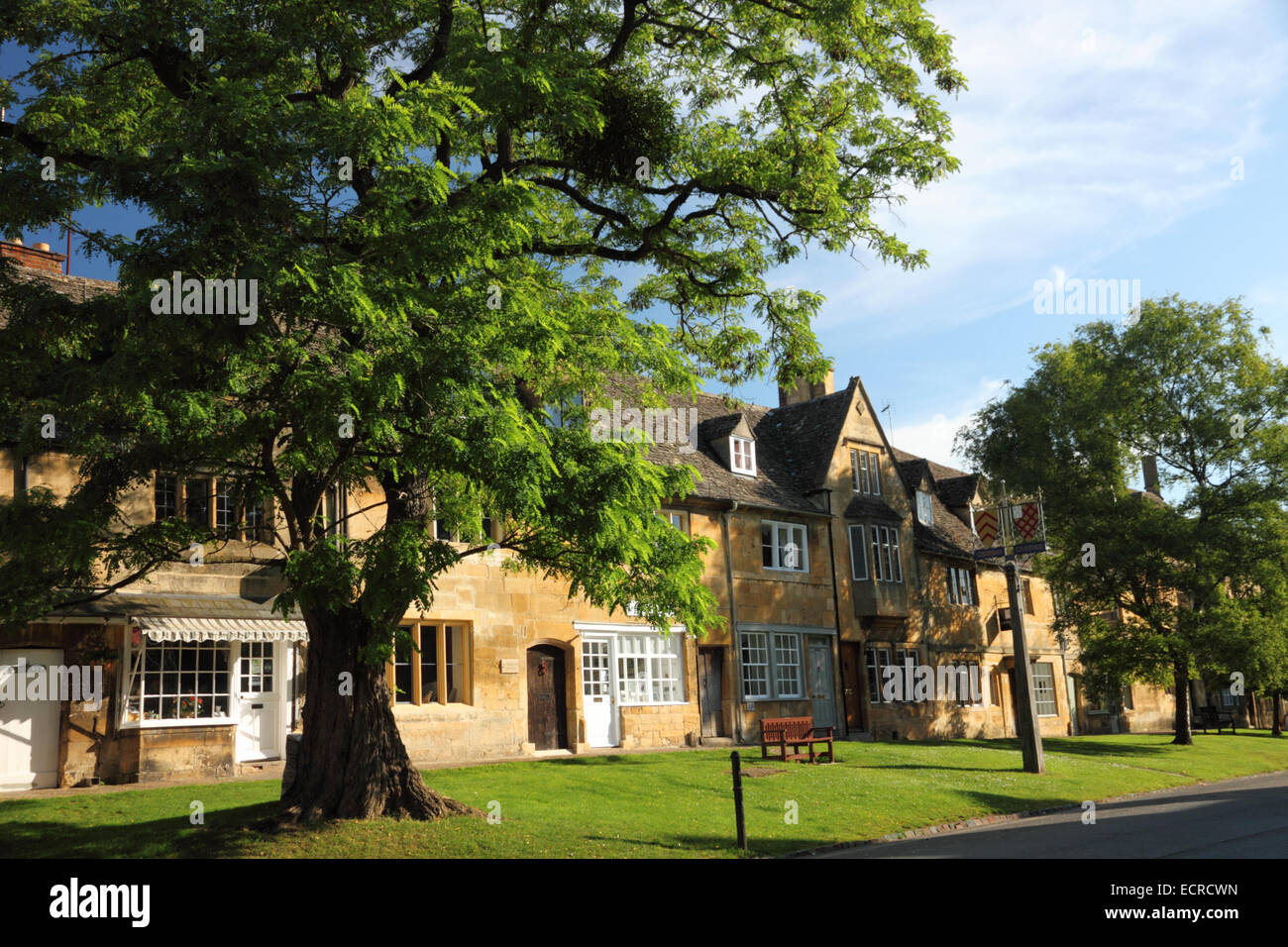 Village house under trees hi-res stock photography and images - Alamy