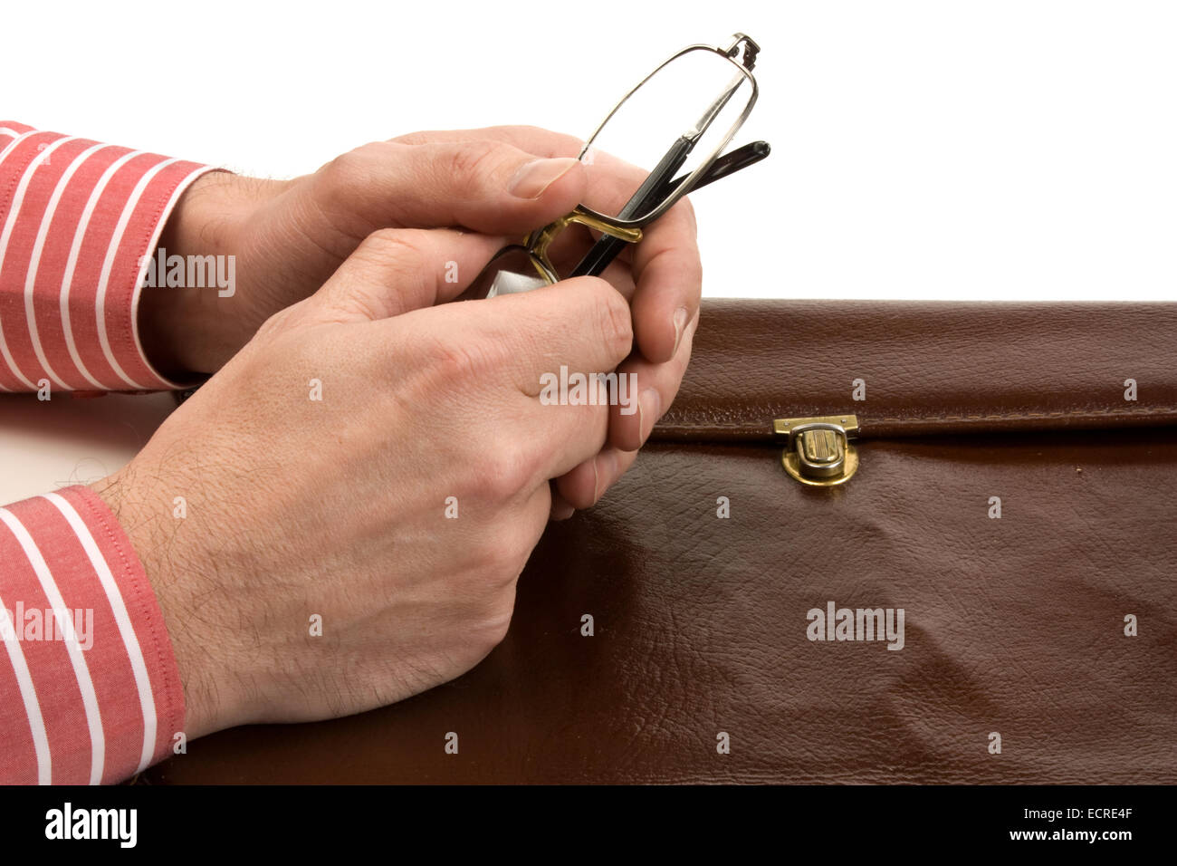 hands holding glasses and leather folder isolated on white background ...