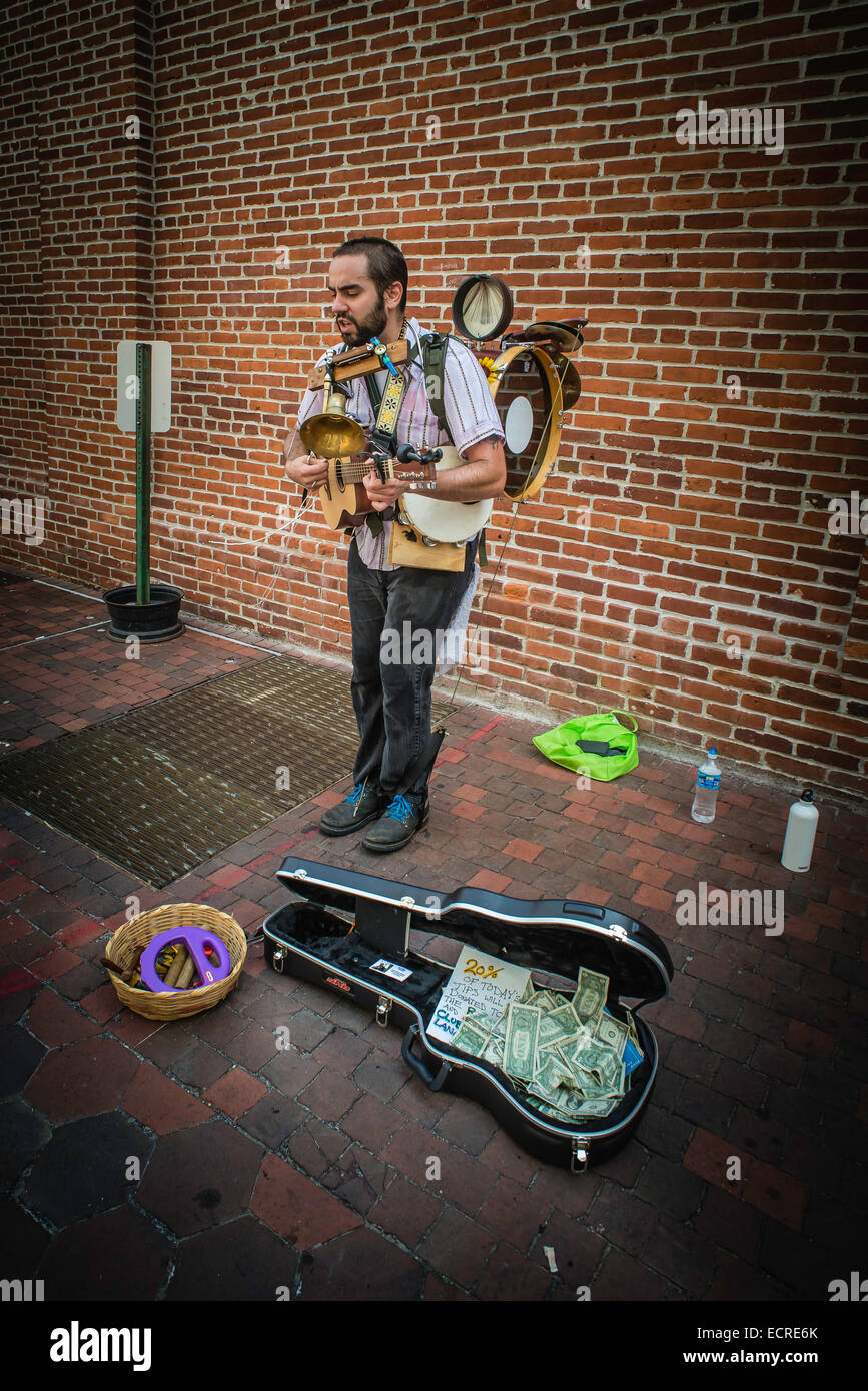 One man band, busker, street musician, outside Lancaster, PA farmers ...