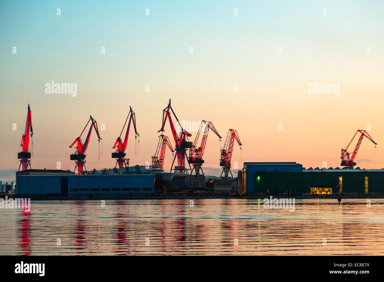 Port warehouse with cargoes and containers Stock Photo - Alamy