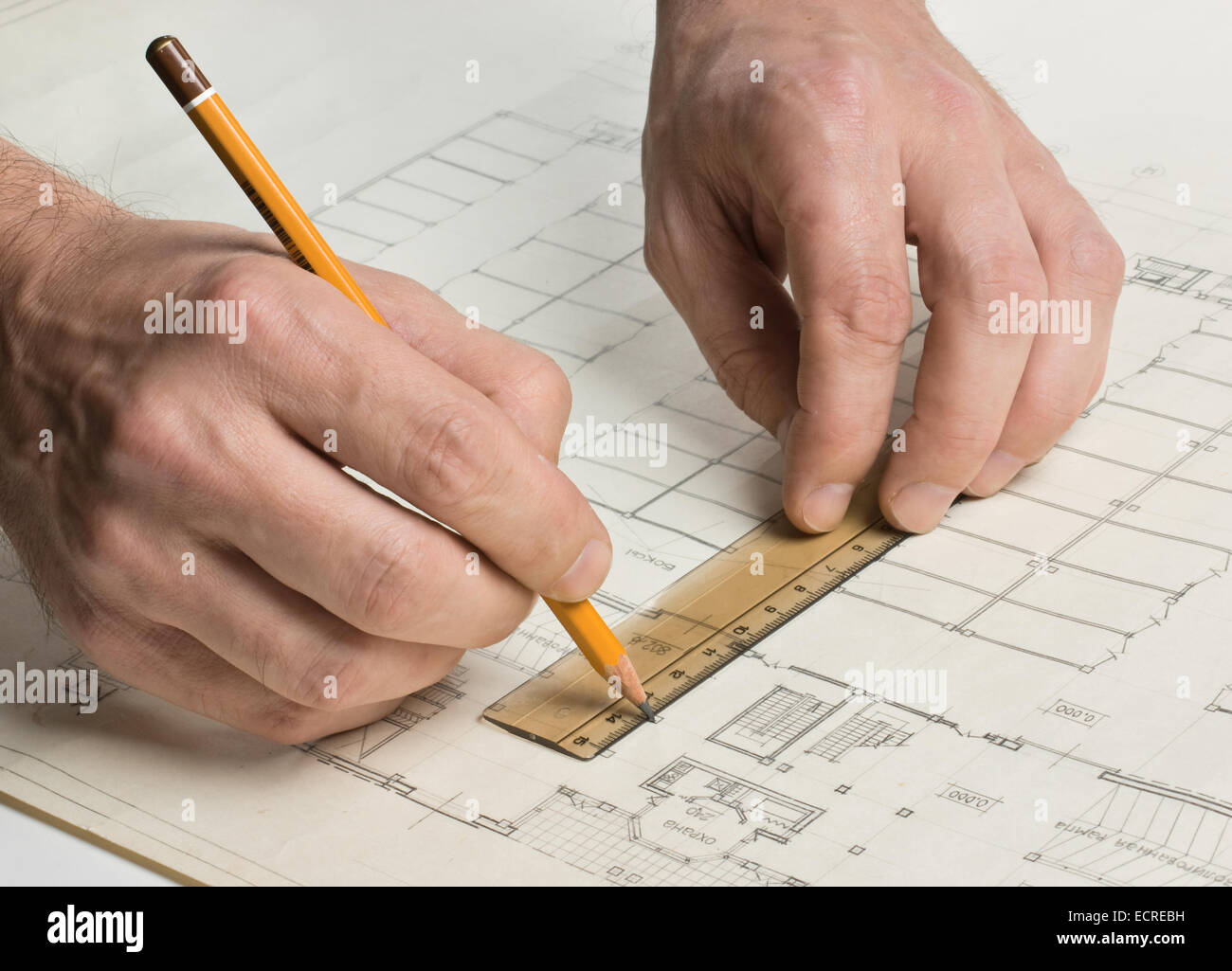 hand draws a pencil on the drawing Stock Photo - Alamy