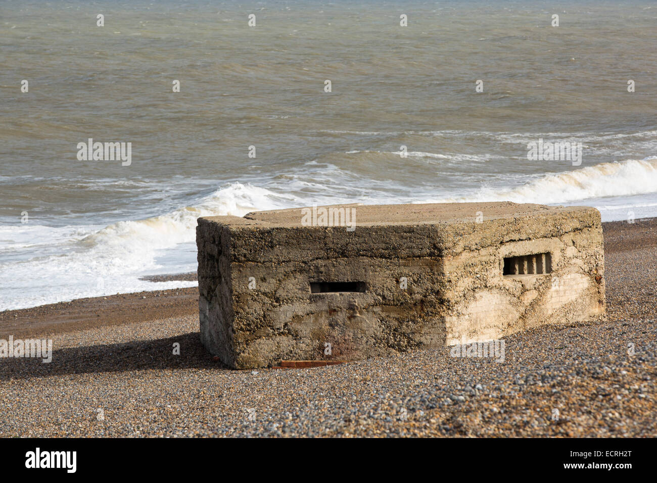 A scond world war concrete pill box on the beach at Cley, Norfolk, UK ...