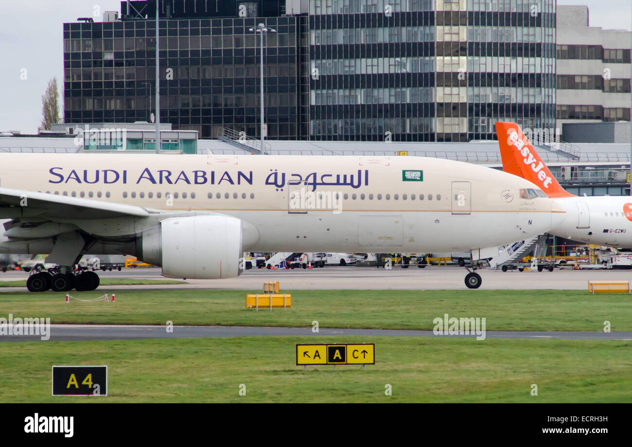 Saudi Arabian Airlines Boeing 777, taxiing in front of Manchester ...
