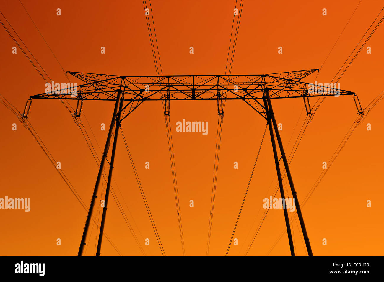 high voltage pylon silhouette at dusk light Stock Photo - Alamy