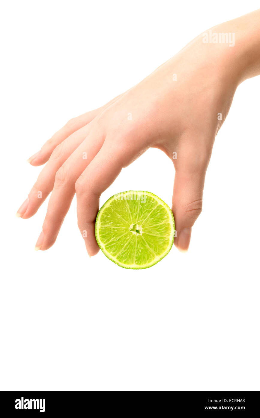 Food: womans hand holding lemon, isolated on white background Stock ...