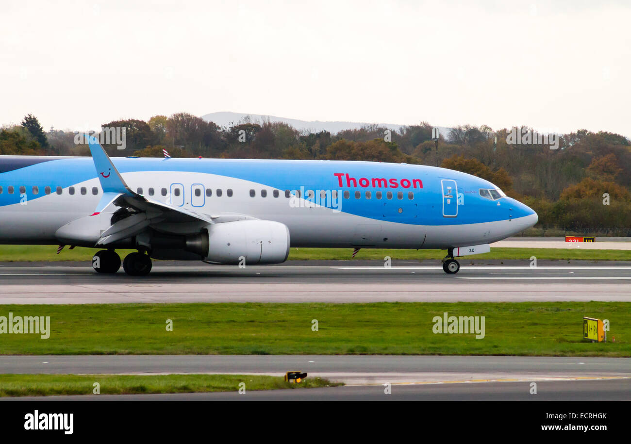 Thomson Airways 737 taxiing at Manchester International Airport runway ...