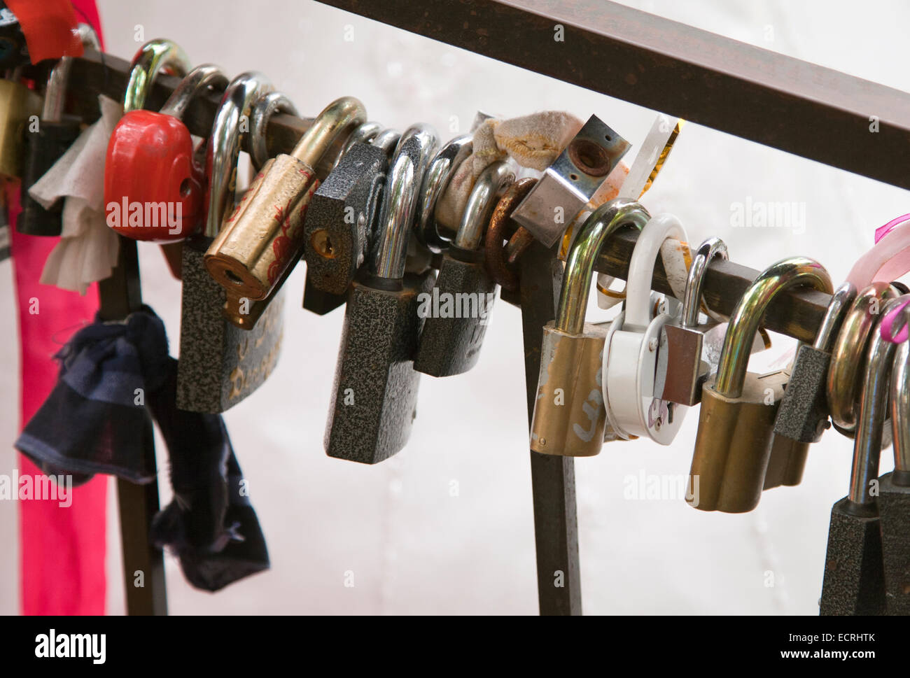 Wedding locks on the rail of a bridge Stock Photo - Alamy