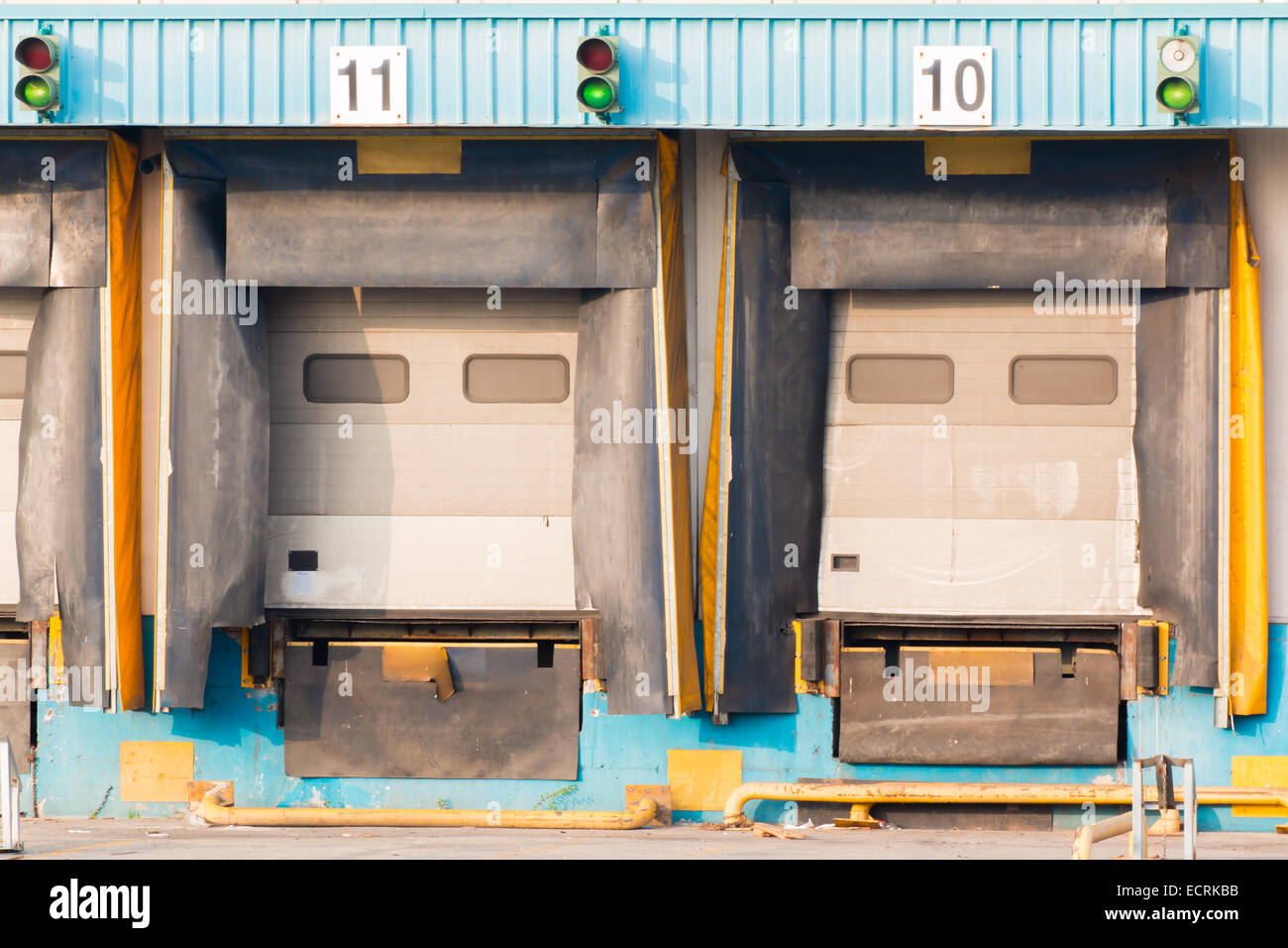 Logistics center's empty Loading dock cargo doors Stock Photo - Alamy