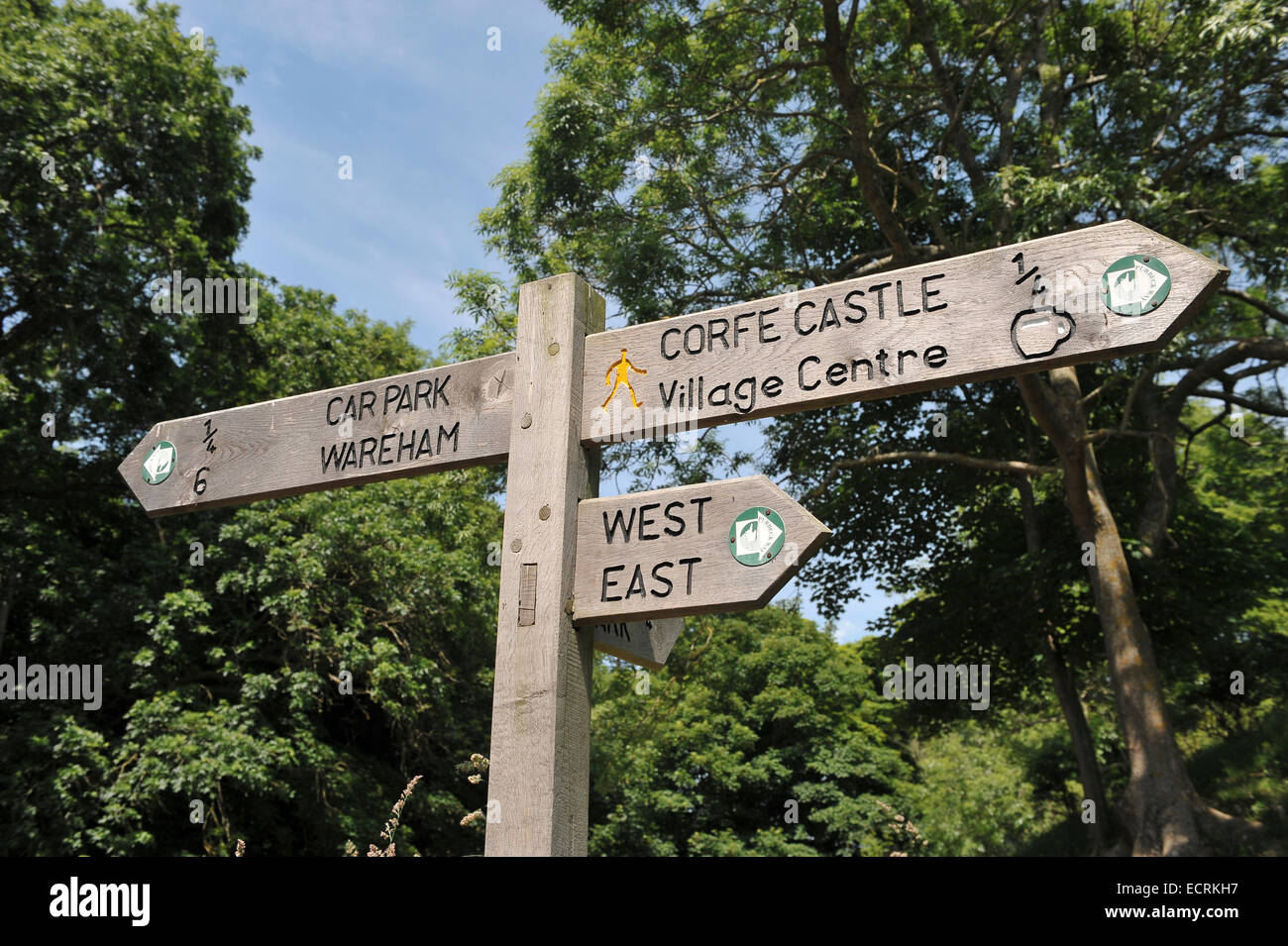 A wooden sign in Corfe Castle Village, Dorset, England, United Kingdom ...
