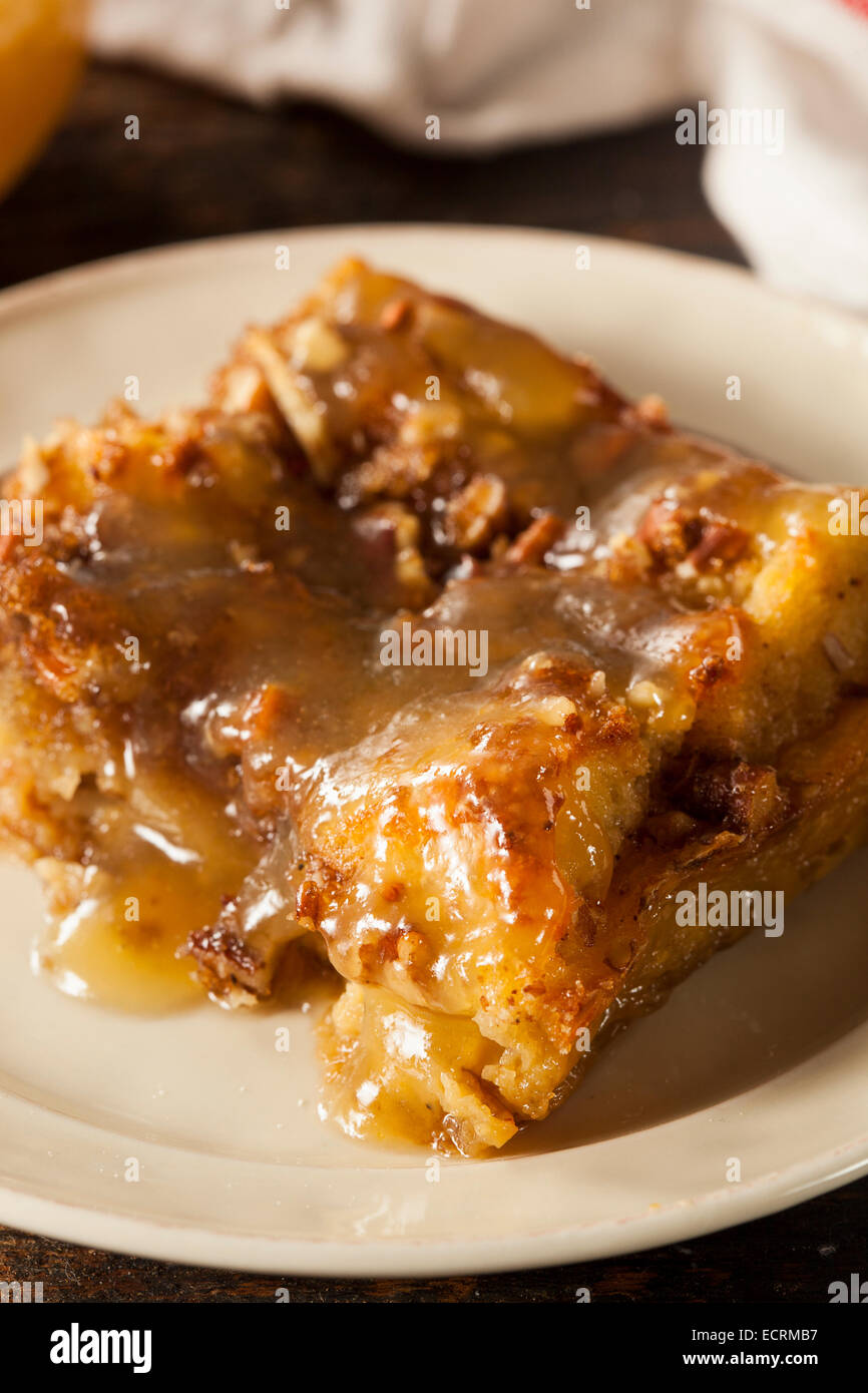 Sweet Homemade Bread Pudding Dessert with Brandy Sauce Stock Photo - Alamy