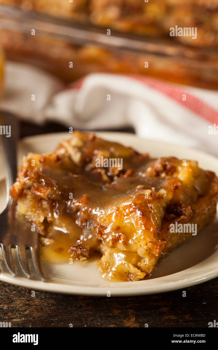 Sweet Homemade Bread Pudding Dessert with Brandy Sauce Stock Photo - Alamy