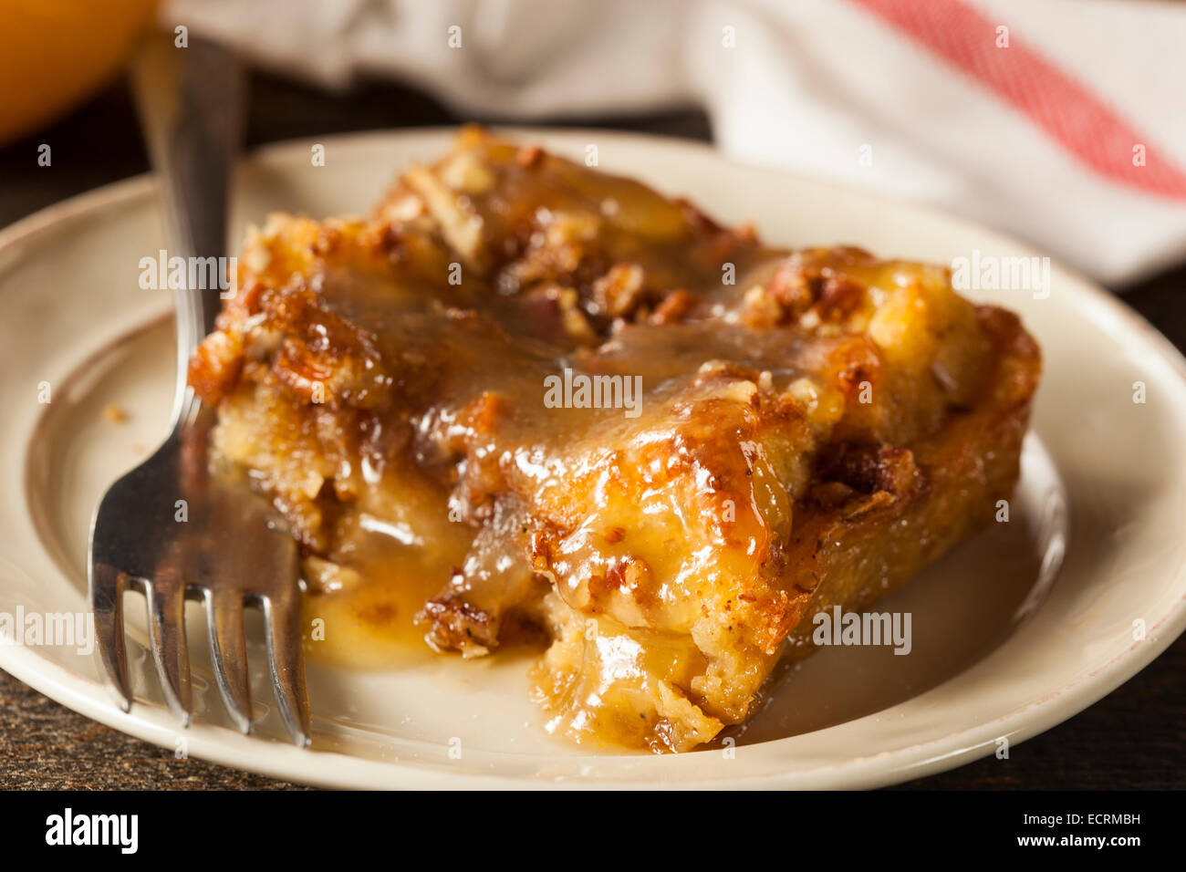 Sweet Homemade Bread Pudding Dessert with Brandy Sauce Stock Photo - Alamy