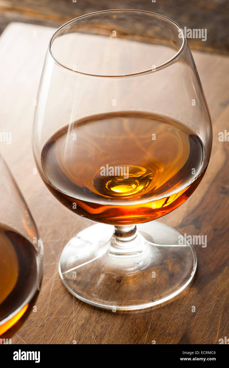 Amber Brandy in a Glass Ready to Drink Stock Photo - Alamy