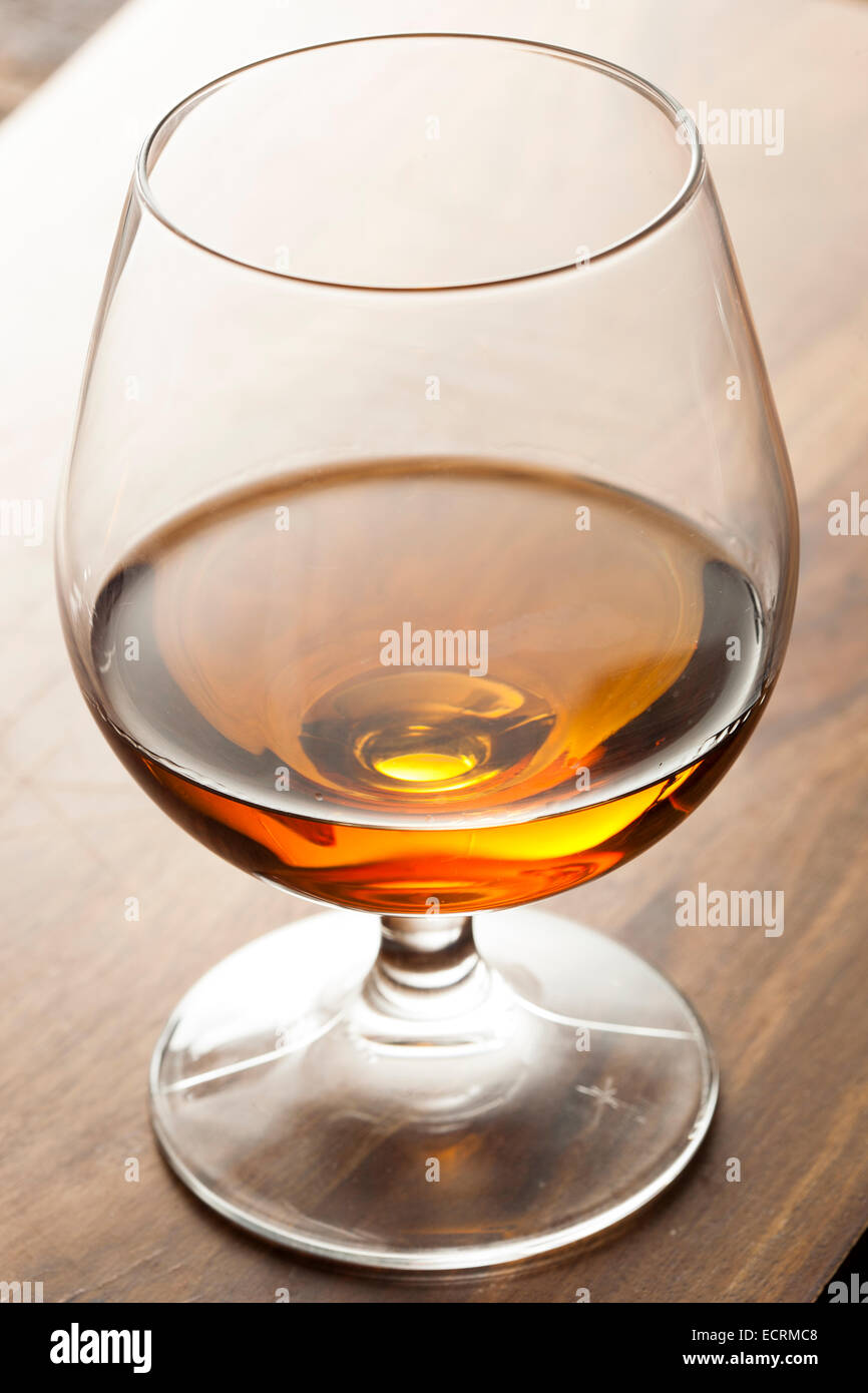 Amber Brandy in a Glass Ready to Drink Stock Photo - Alamy