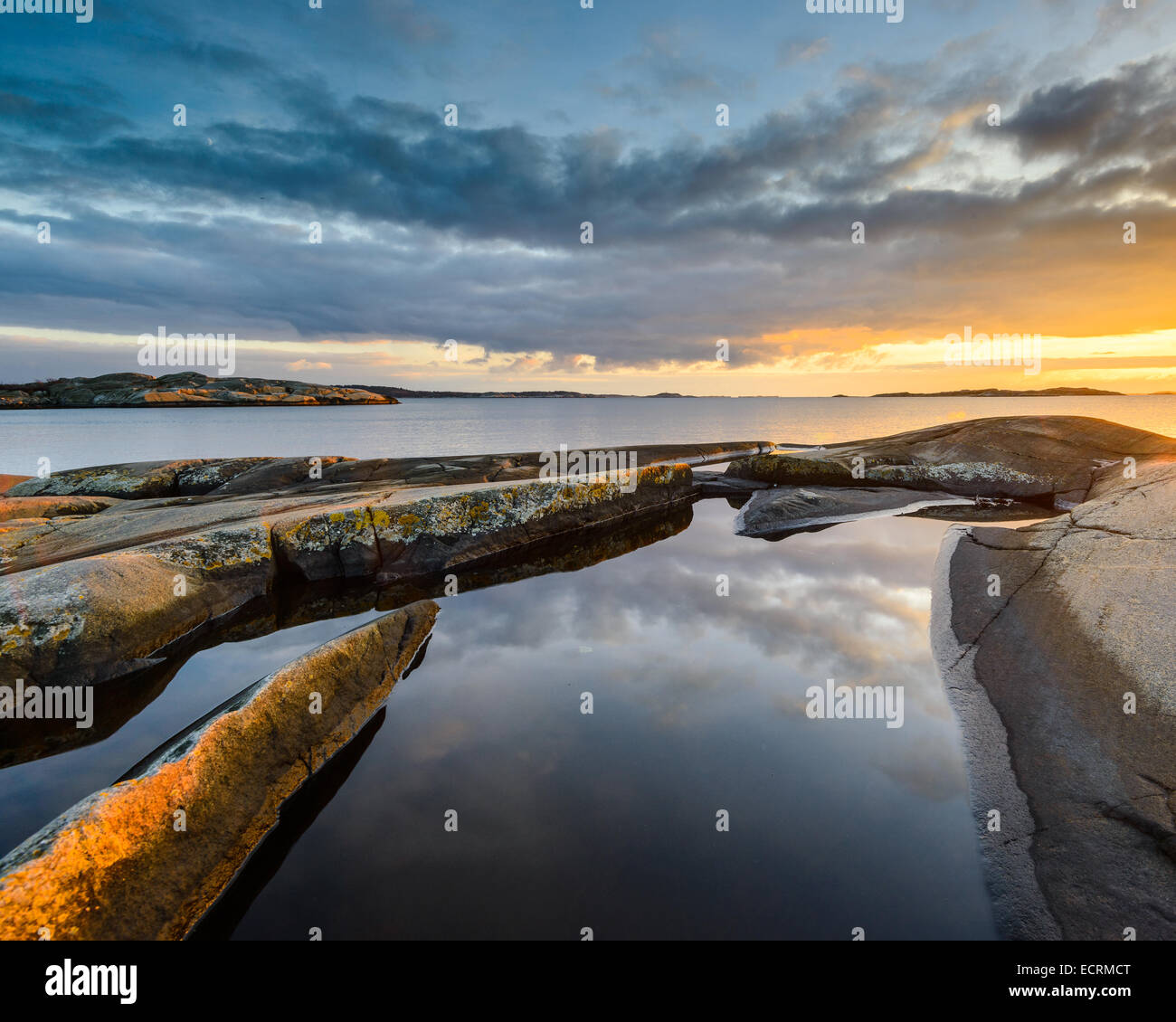 Tide pools and the ocean at sunset Stock Photo - Alamy