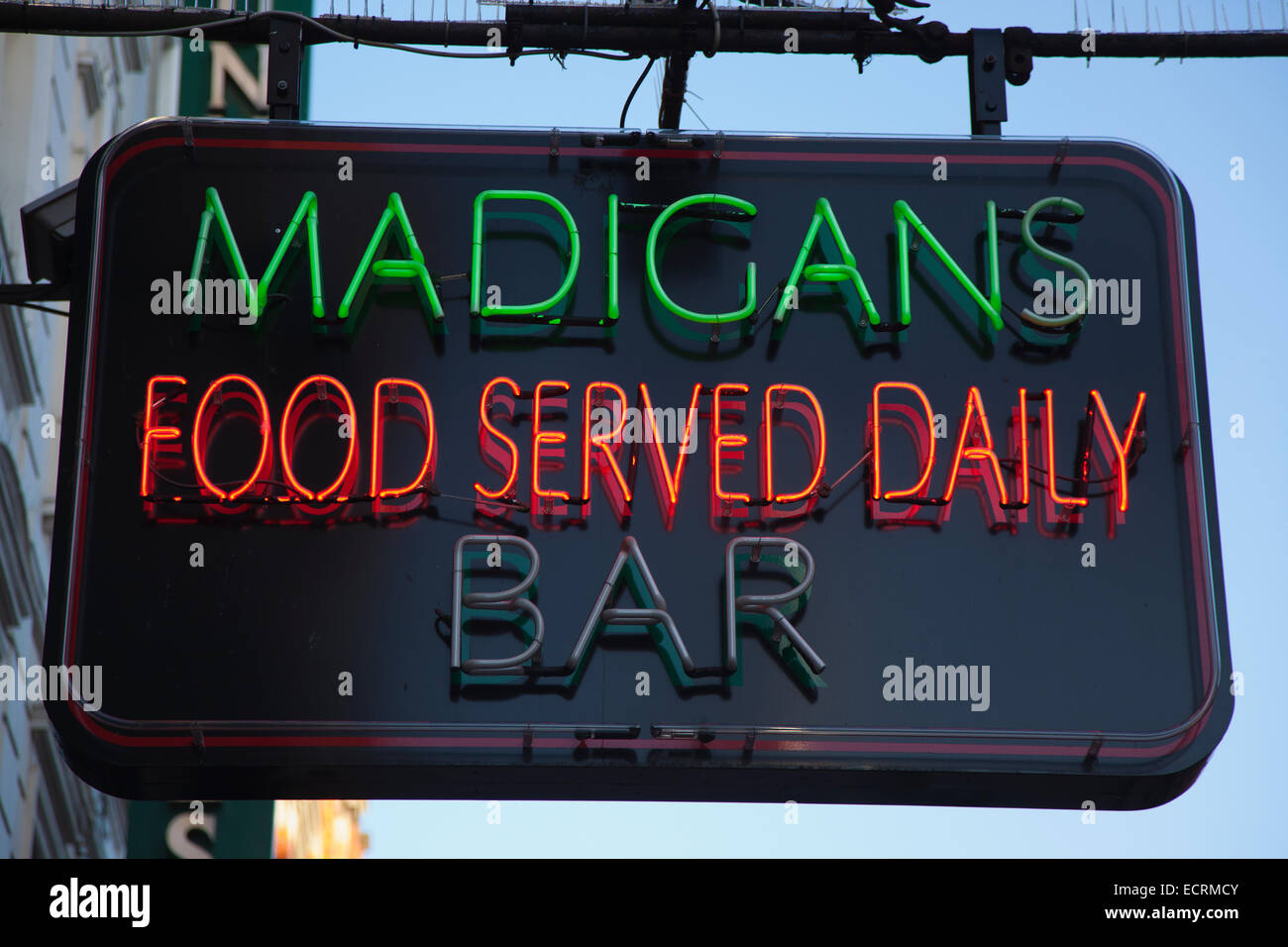 Ireland, Dublin, Neon sign outside Madigans bar in Earl Street Stock ...