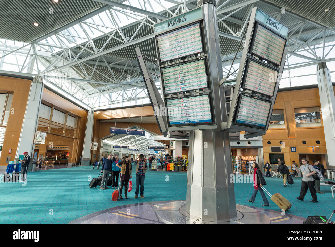 Gate board in the atrium of the terminal in Portland International ...