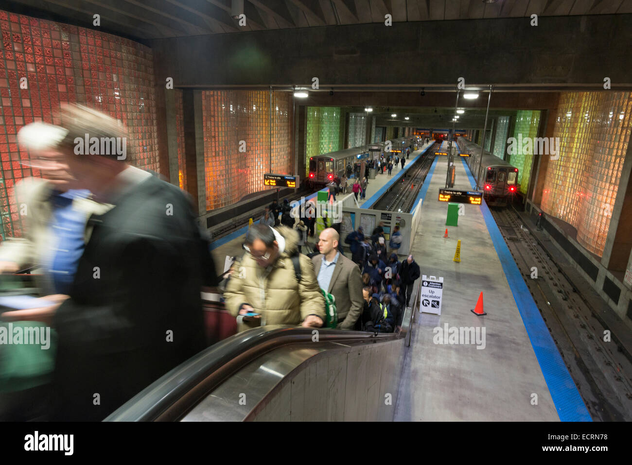 Travelers at the O'Hare International Airport subway station in Chicago ...