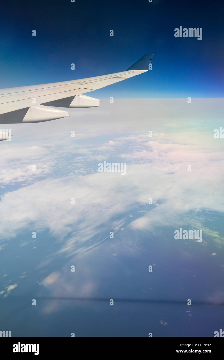 The shadow of a contrail on clouds from a jet plane Stock Photo - Alamy