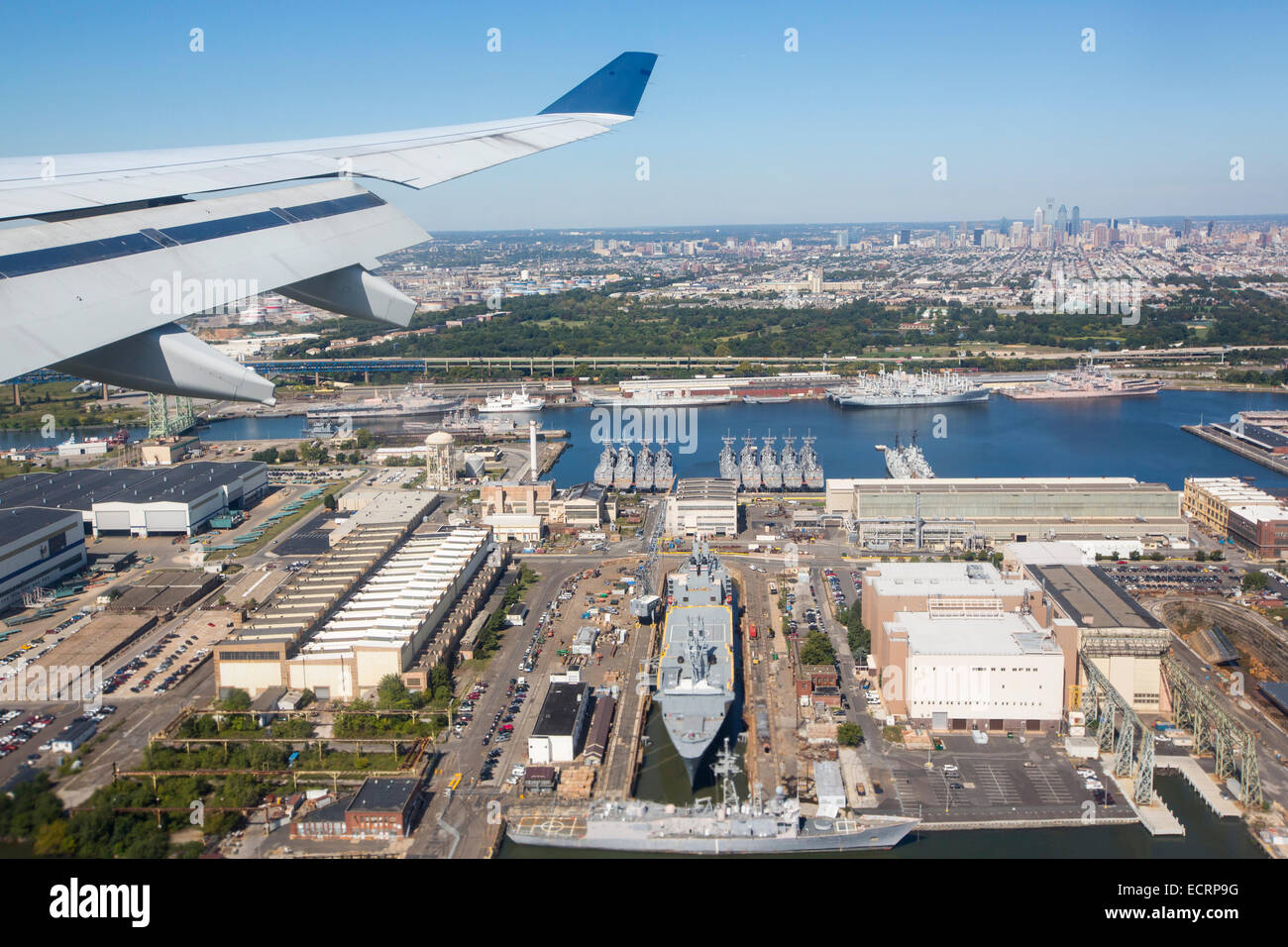 Flying over the Naval Base in Philadelphia, with warships from the ...
