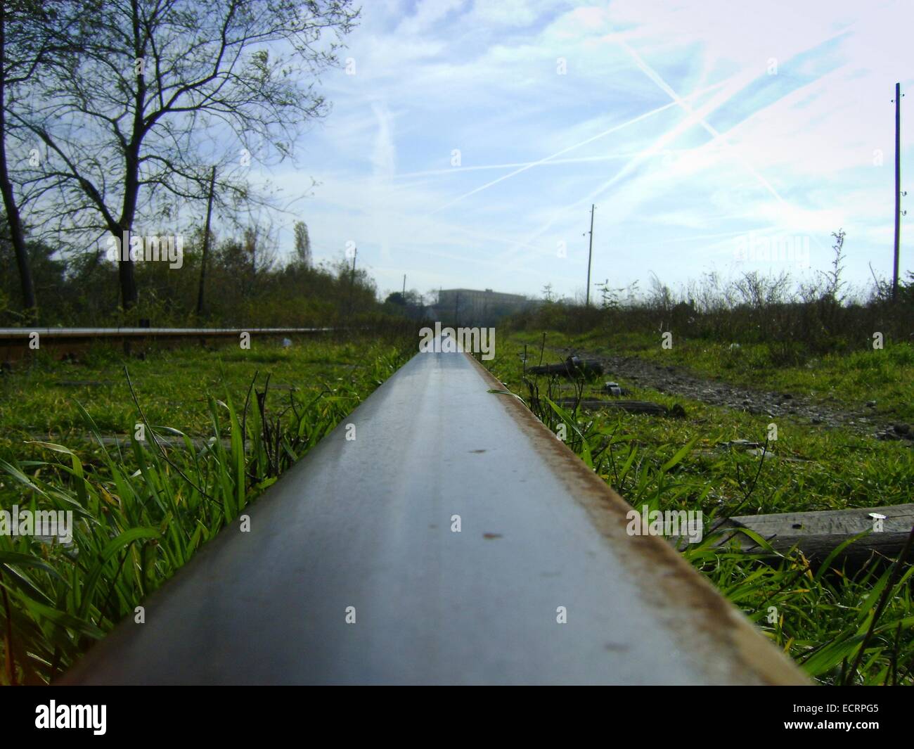 Right railroad tracks leading into the distance Stock Photo - Alamy