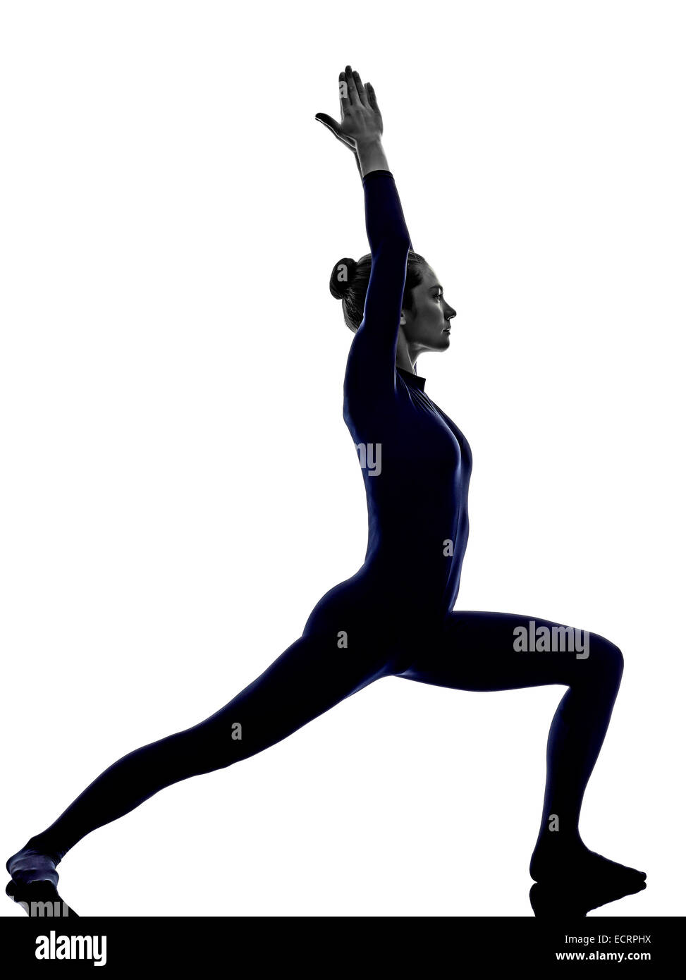 woman exercising Virbhadrasana I warrior pose yoga silhouette shadow ...