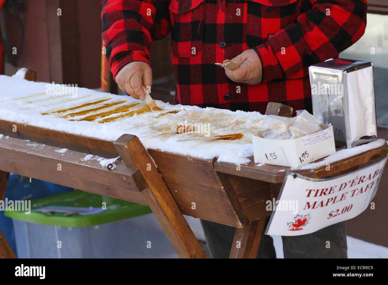 The Process Of Making Maple Taffy Using Canadian Maple Syrup And Snow the-process-of-making-maple-taffy-using-canadian-maple-syrup-and-snow