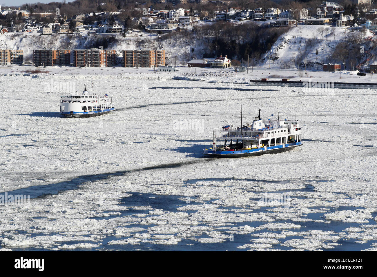 The Quebec Ferry's crossing the St. Lawrence through heavy ice Stock ...