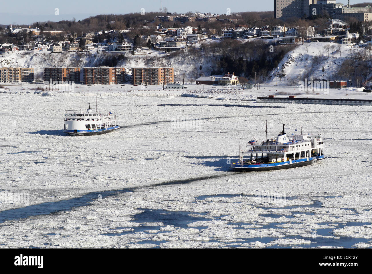 The Quebec Ferry's crossing the St. Lawrence through heavy ice Stock ...