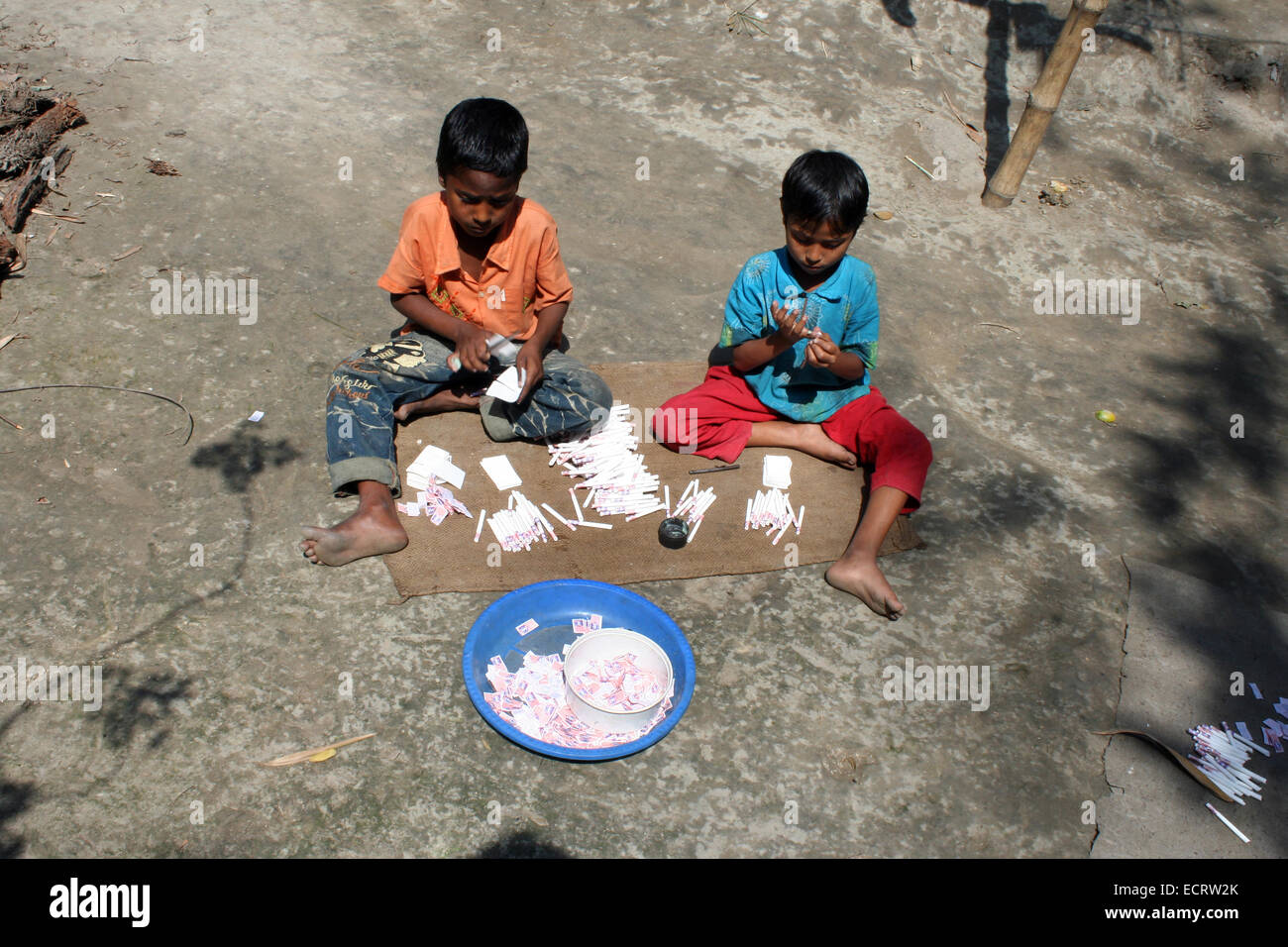 Bangladesh 8 may 2010. Child fill hand rolled cigarette (locally called ...