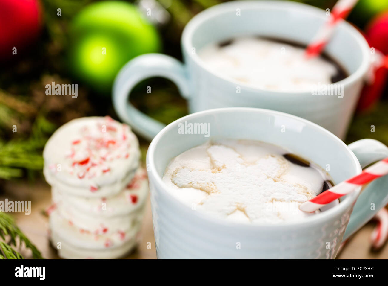 Homemade hot chocolate garnished with snowflake shaped white ...