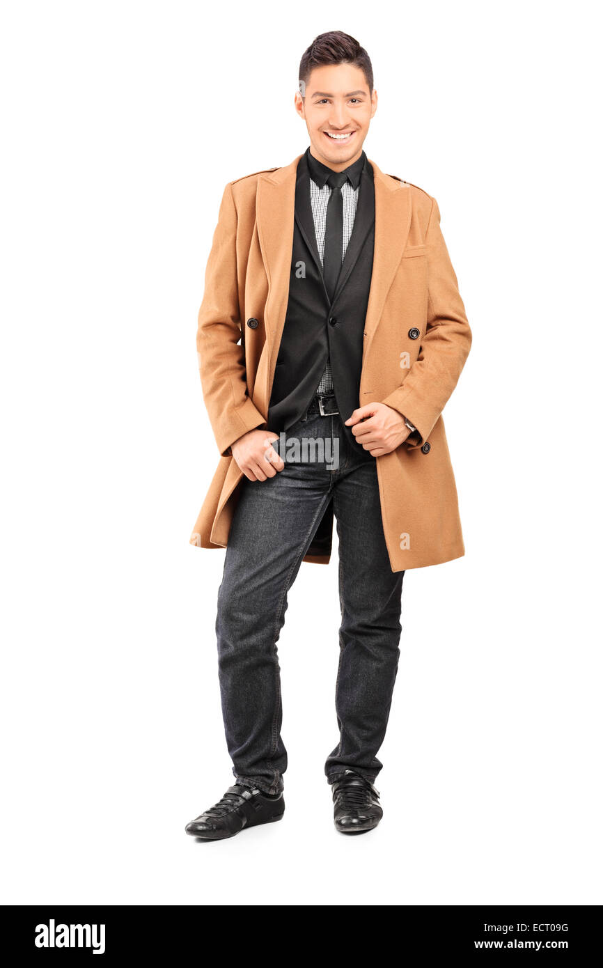 Full length portrait of a fashion model posing in classy clothes ...