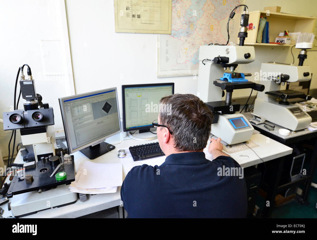 Materials tester doing quality check in hardening shop Stock Photo - Alamy